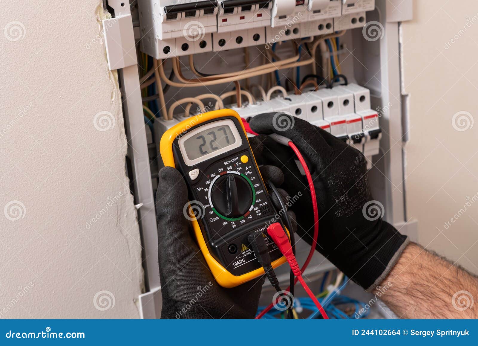 Electrician Works with Electrical Automated. Electrical Switchboard ...
