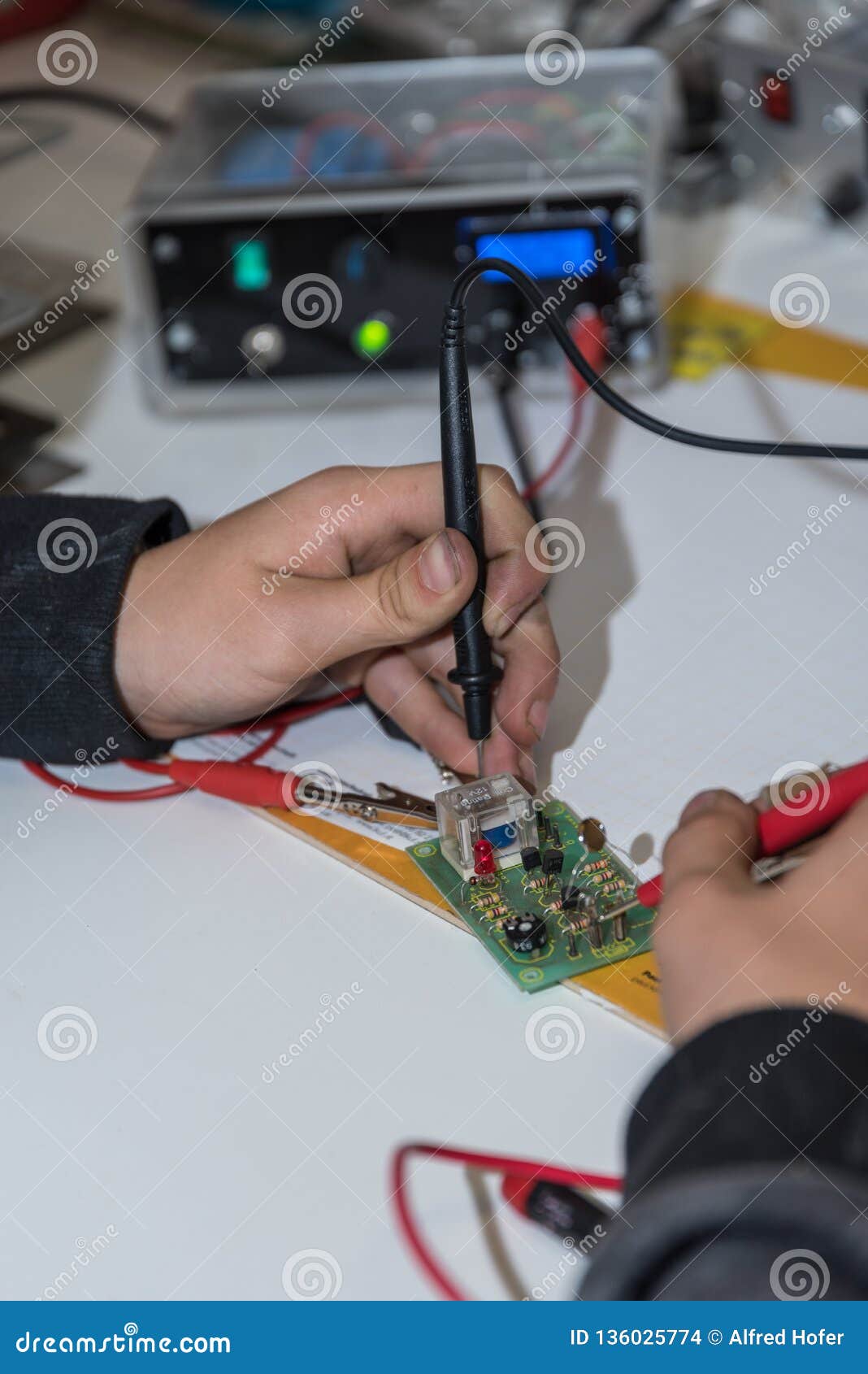Electrician Works with Voltage Tester Stock Photo - Image of live ...