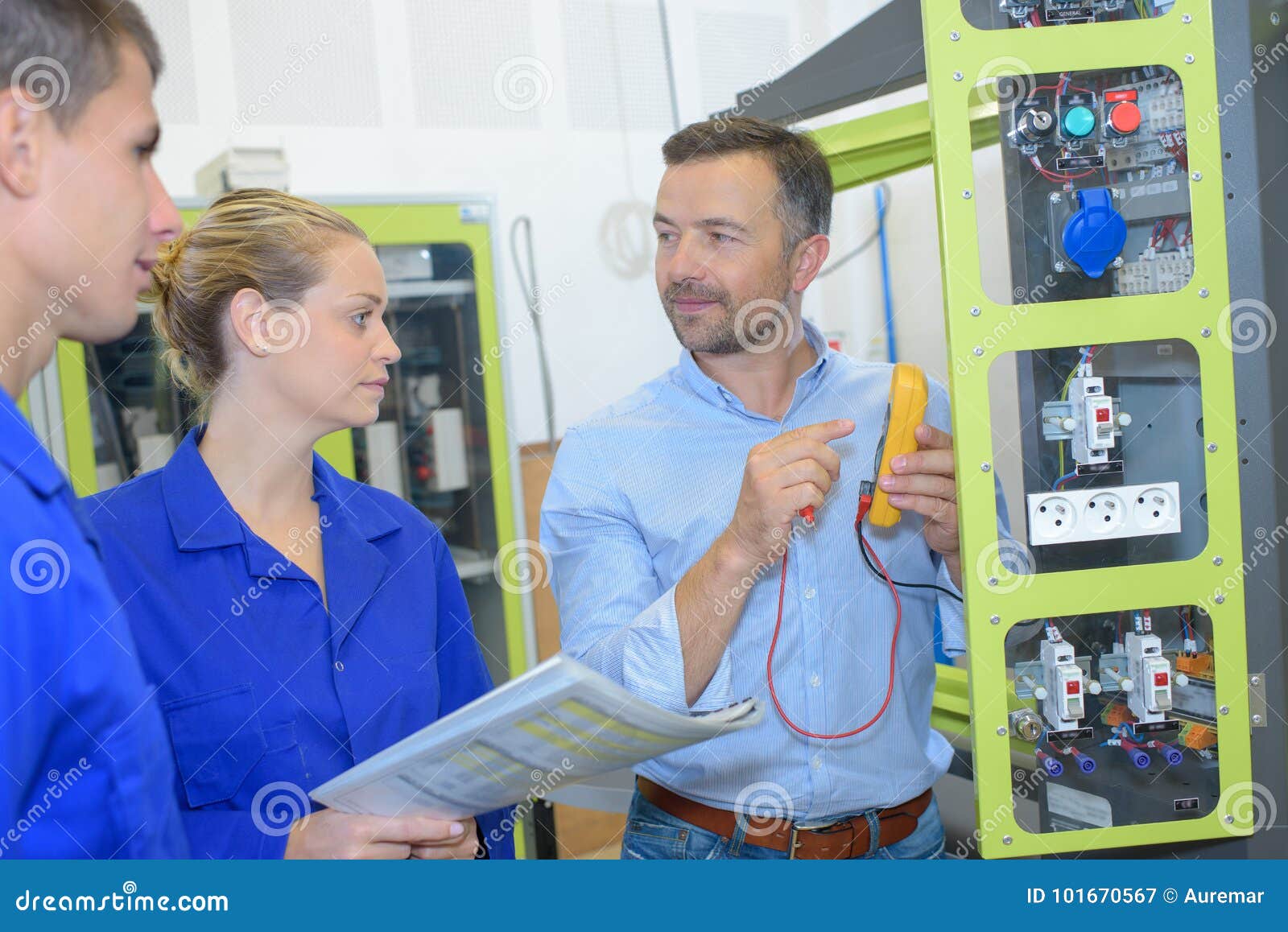 Electricians Checking Voltage In Partially Mounted Electrical Socket ...
