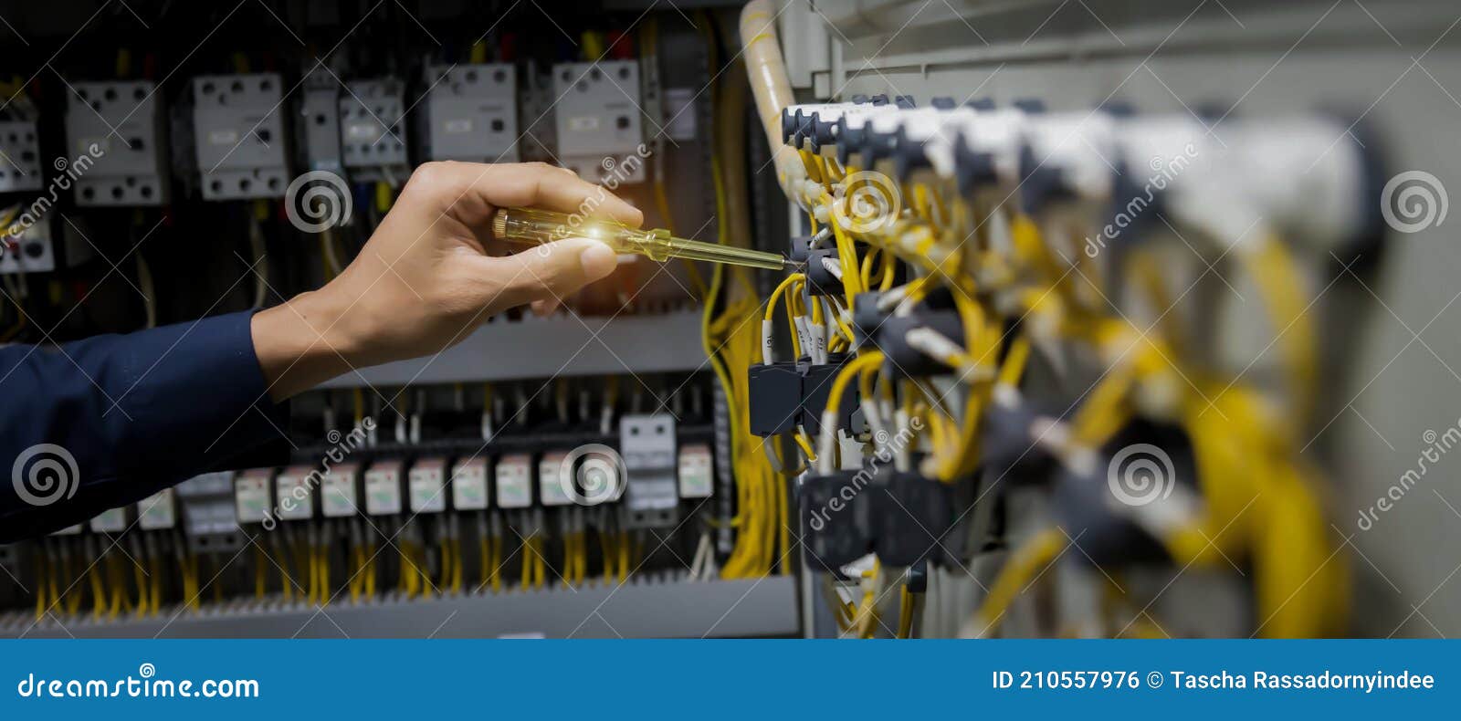 Electricians Hands Testing Switches In Electric Box. Electrical Panel ...