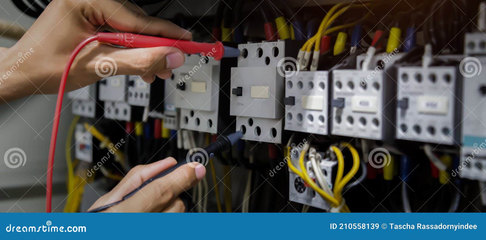 Electricians Hands Testing Current Electric in Control Panel Stock ...