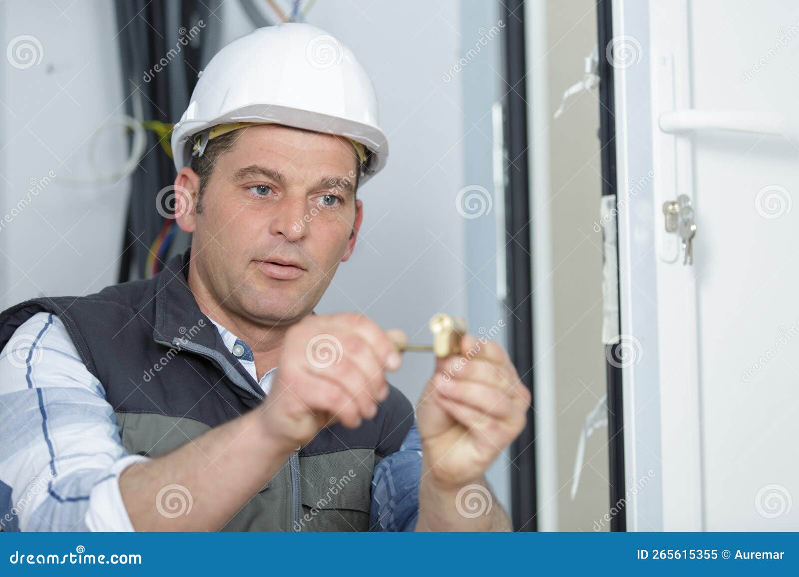 Electricians Holding Electric Wires Stock Image - Image of worker ...