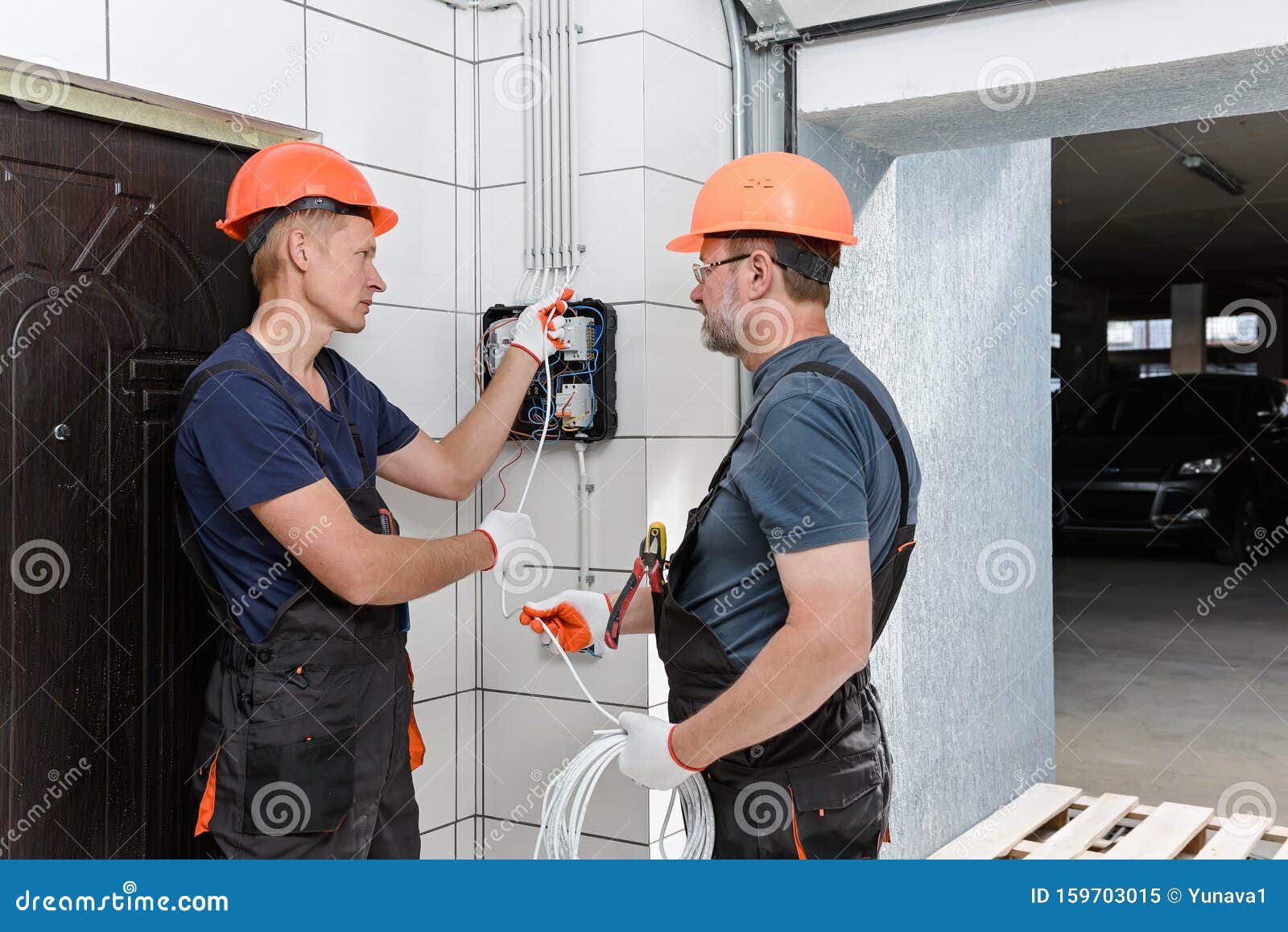 Electrical work indoors stock image. Image of foreman - 159703015