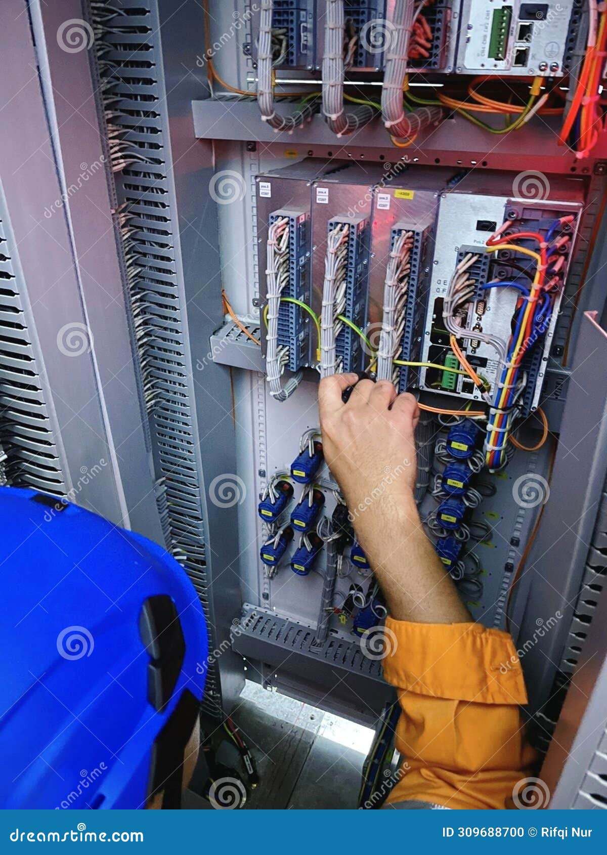Electricians Testing Wiring on Electric Box Panel Stock Photo - Image ...