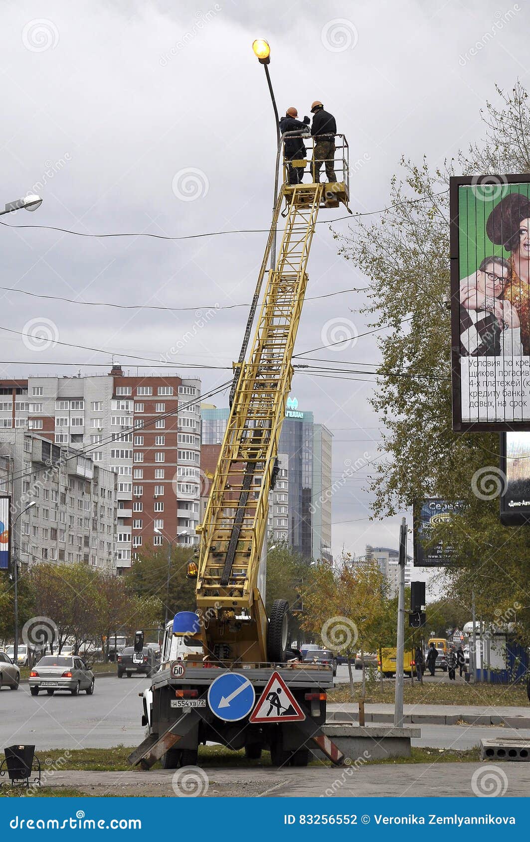 Electricians on a Tower Repair a Streetlight. Editorial Photography ...