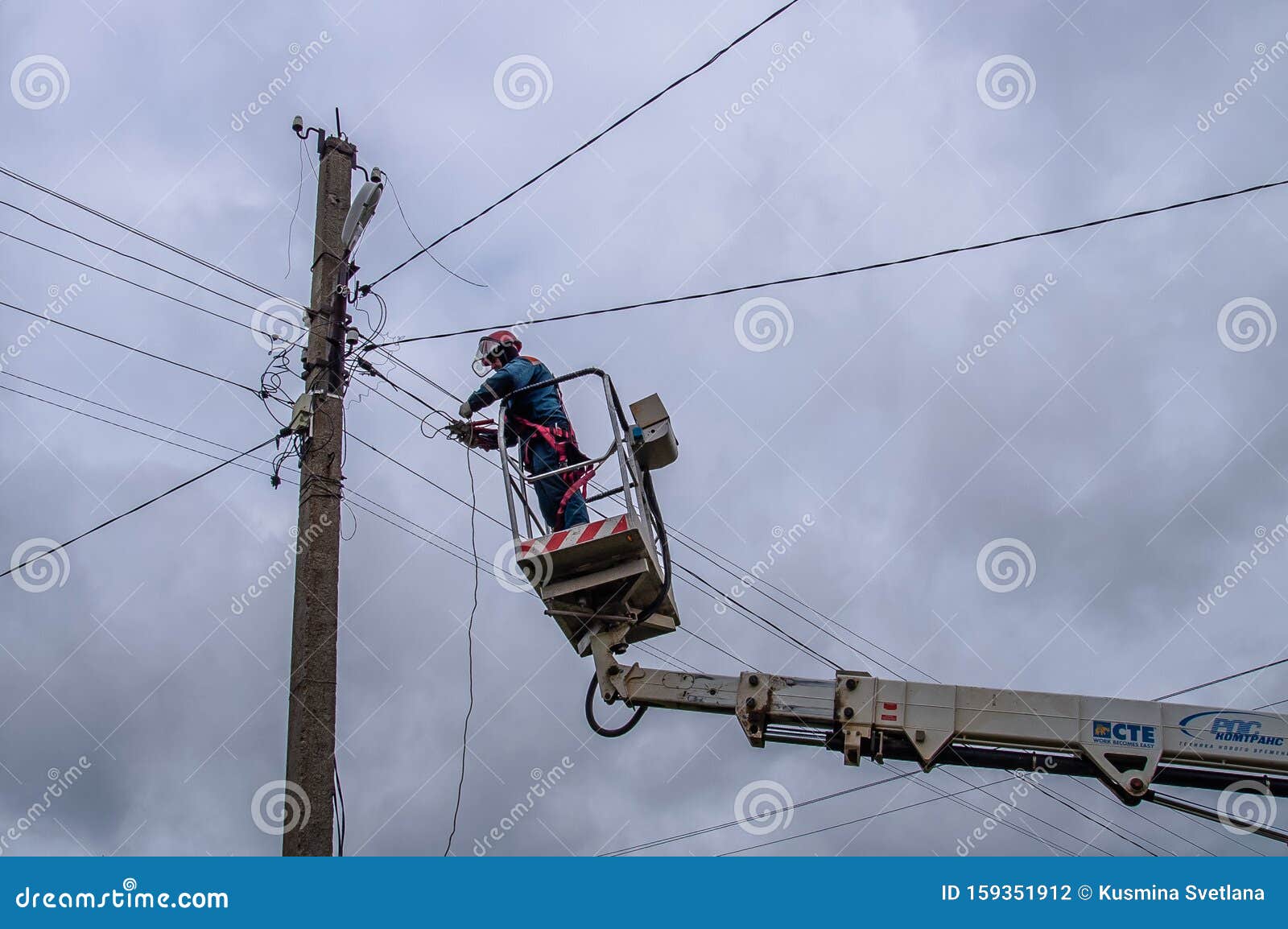 Electricians Work on Inspection and Replacement of Lighting Poles ...