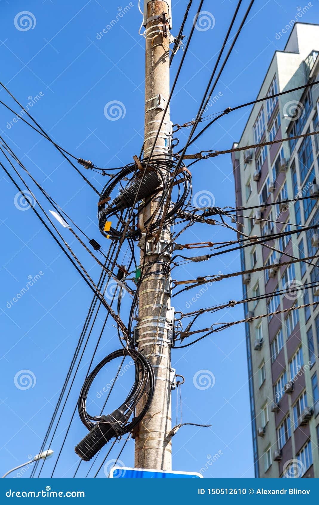 Electricity and Communication Cables are Fixed on the Pole Stock Photo ...
