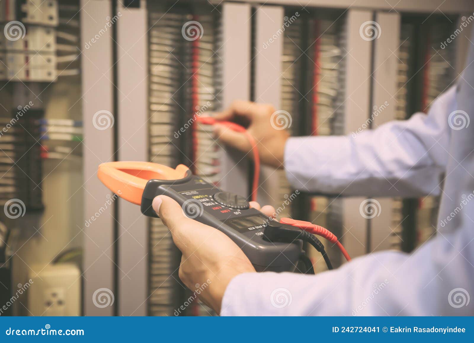 Engineer Hand Holding AC Voltmeter Checking Electric Current Voltage at ...