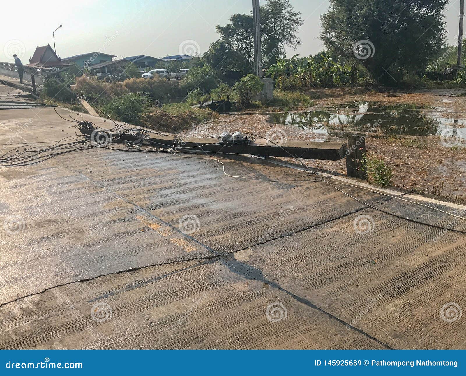 Electricity Pole Fall Down Near the Road Stock Image - Image of fallen ...