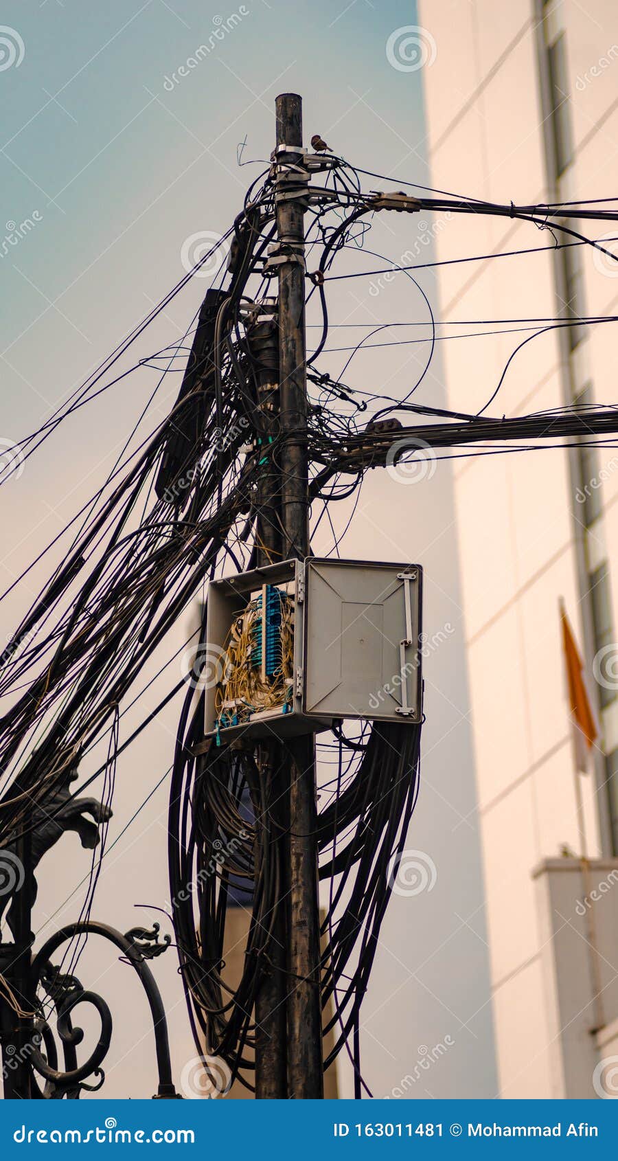An Electricity Pole with Many Wires Stock Image - Image of street ...