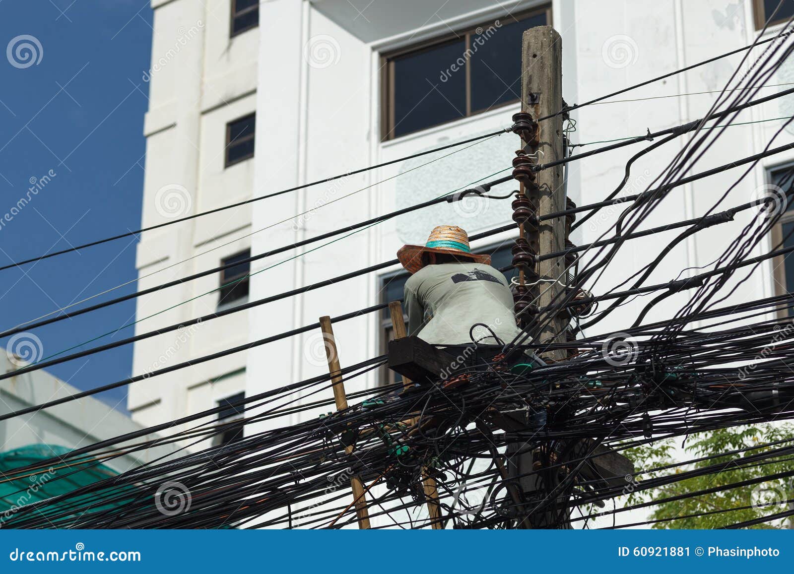Electricity post in town stock image. Image of blue, line - 60921881