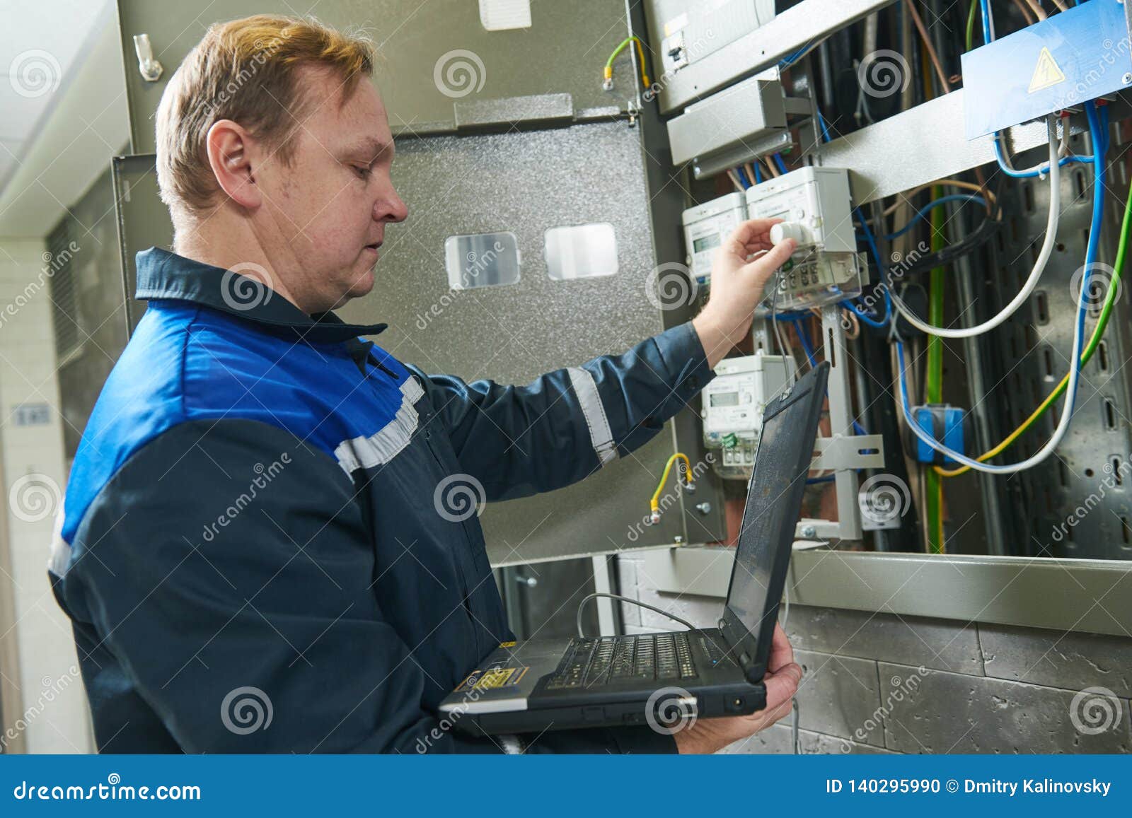 Electricity Power Control and Metering. Worker Checks Data Stock Photo ...