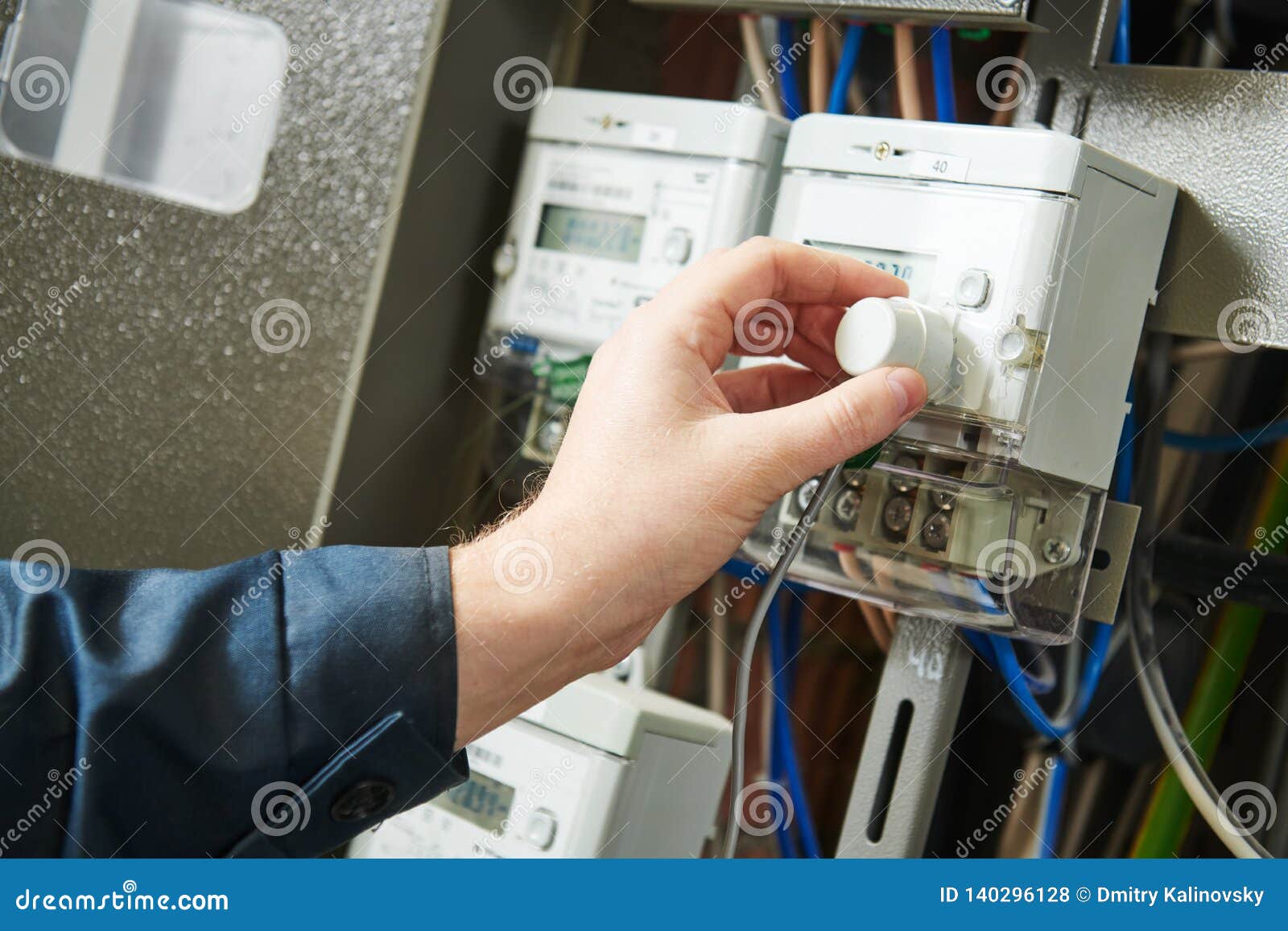 Electricity Power Control and Metering. Worker Collects Data Stock ...