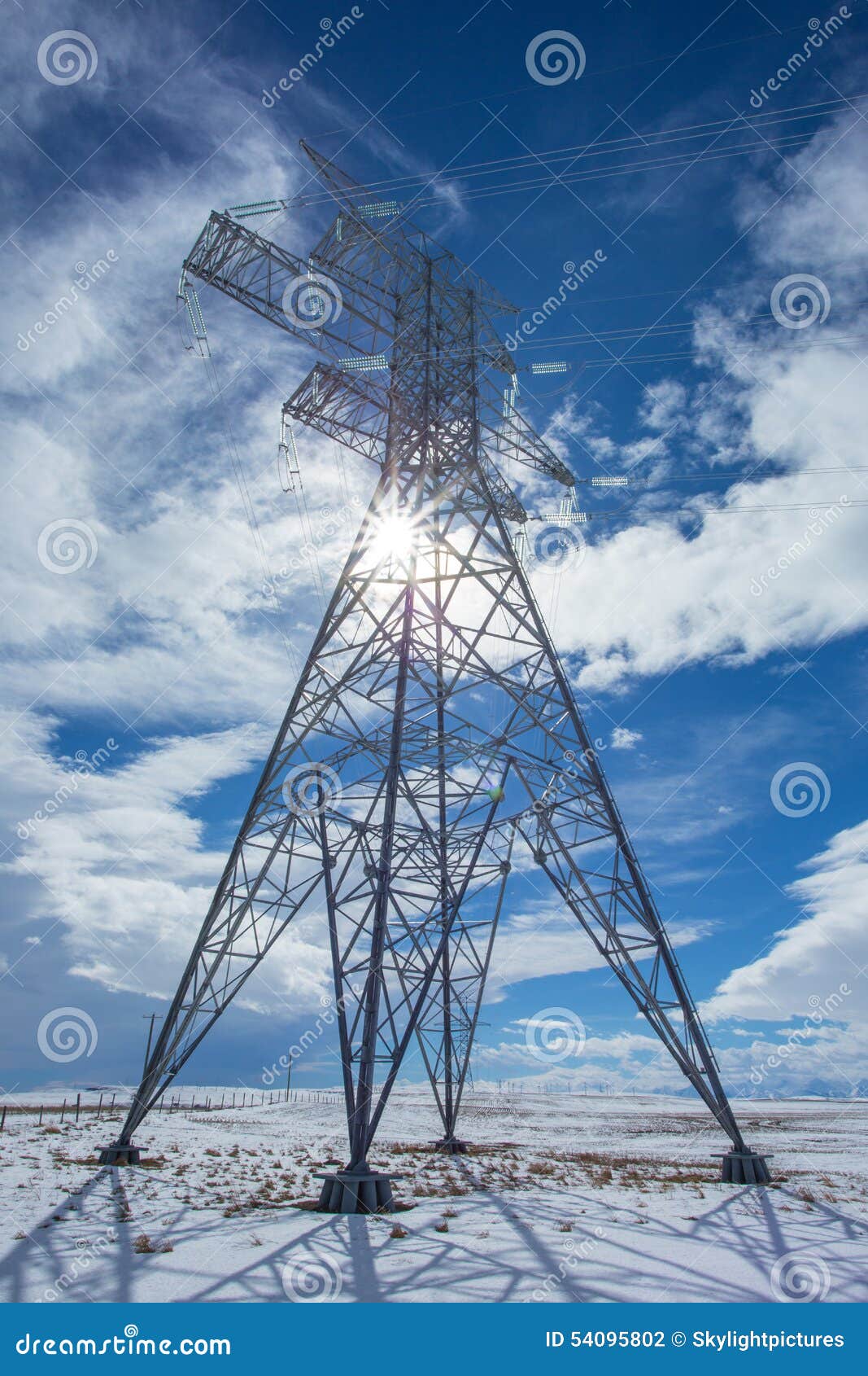 Electricity Pylon with Sun stock photo. Image of insulators - 54095802