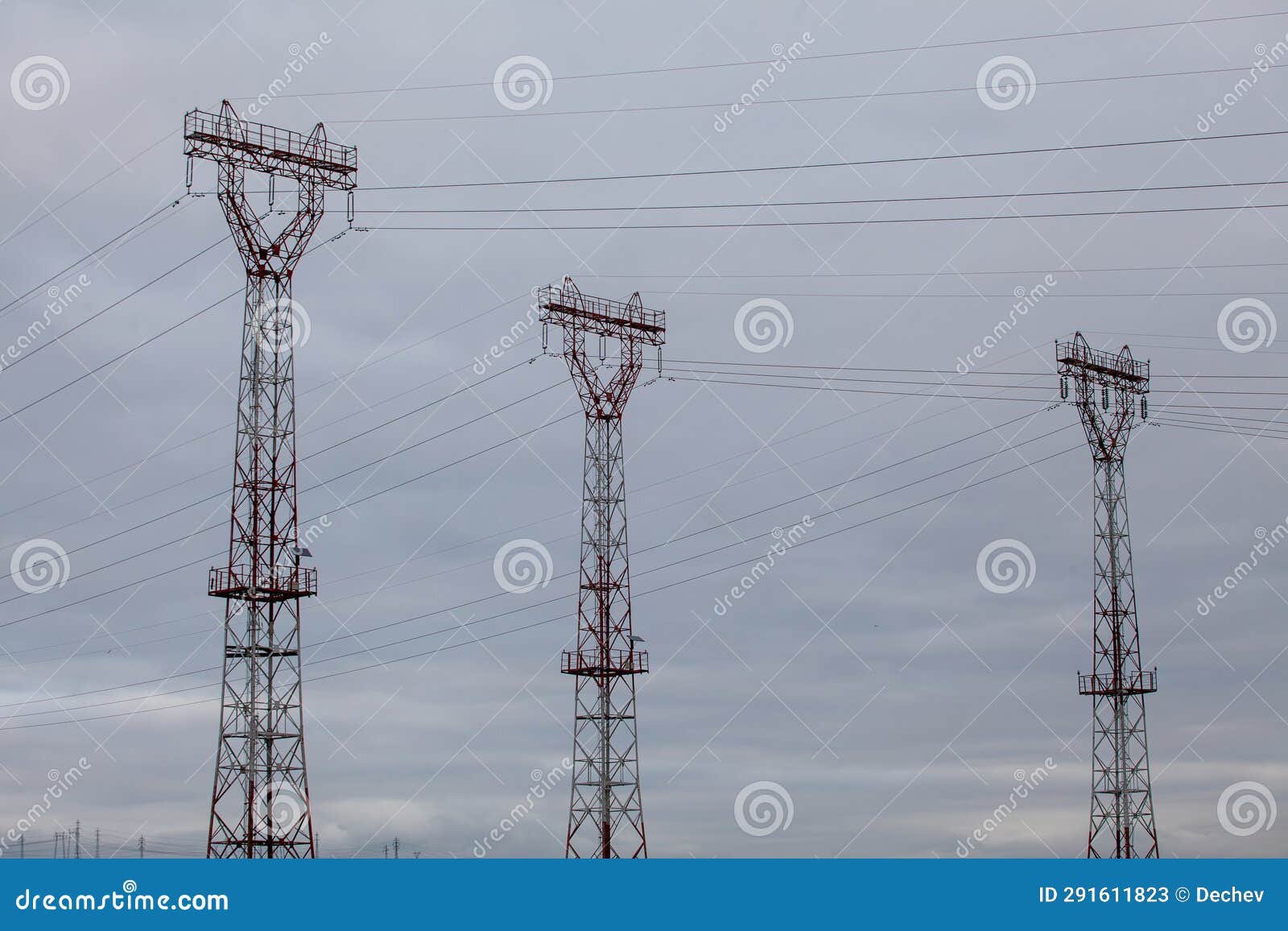 Electricity Pylons and Cable Lines Against Cloudy Sky Stock Image ...