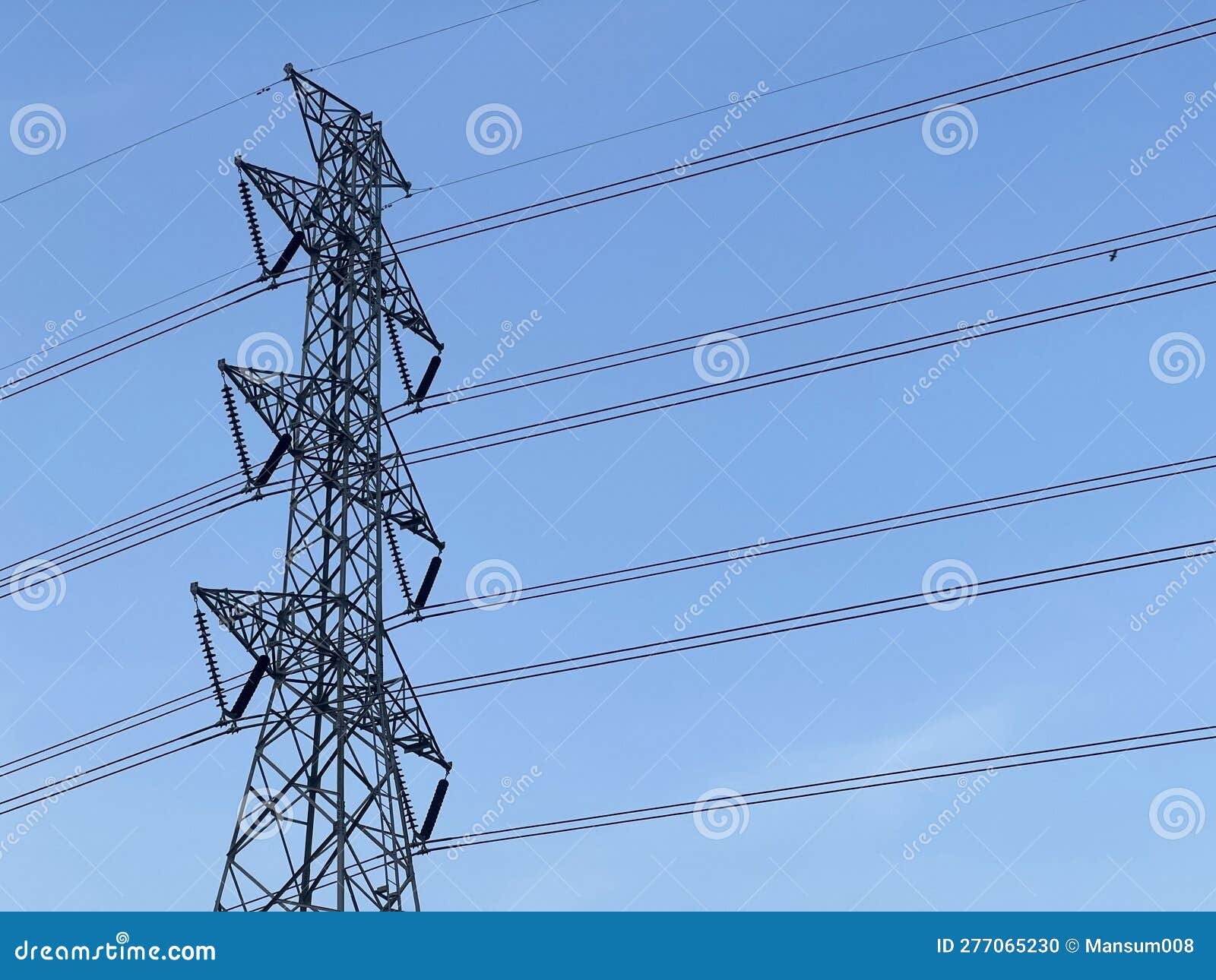 Electricity Pylons with Electrical Wires on Blue Sky Background Stock ...