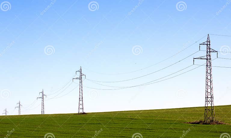 Electricity pylons line stock photo. Image of pylons - 16784144