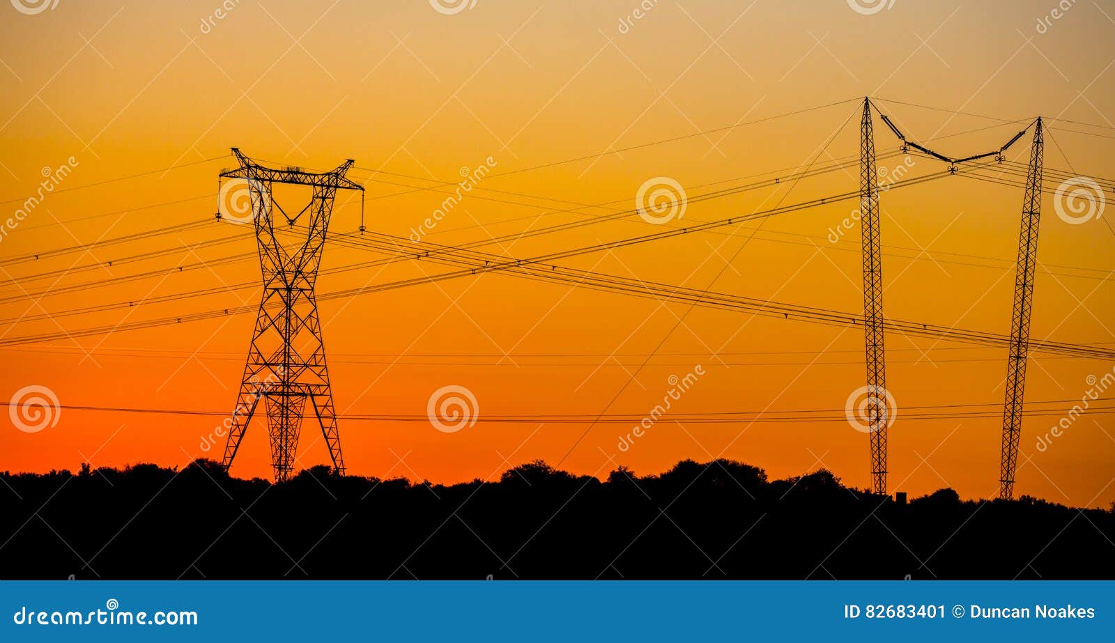 Electricity Pylons at Sunset Stock Image - Image of black, energy: 82683401