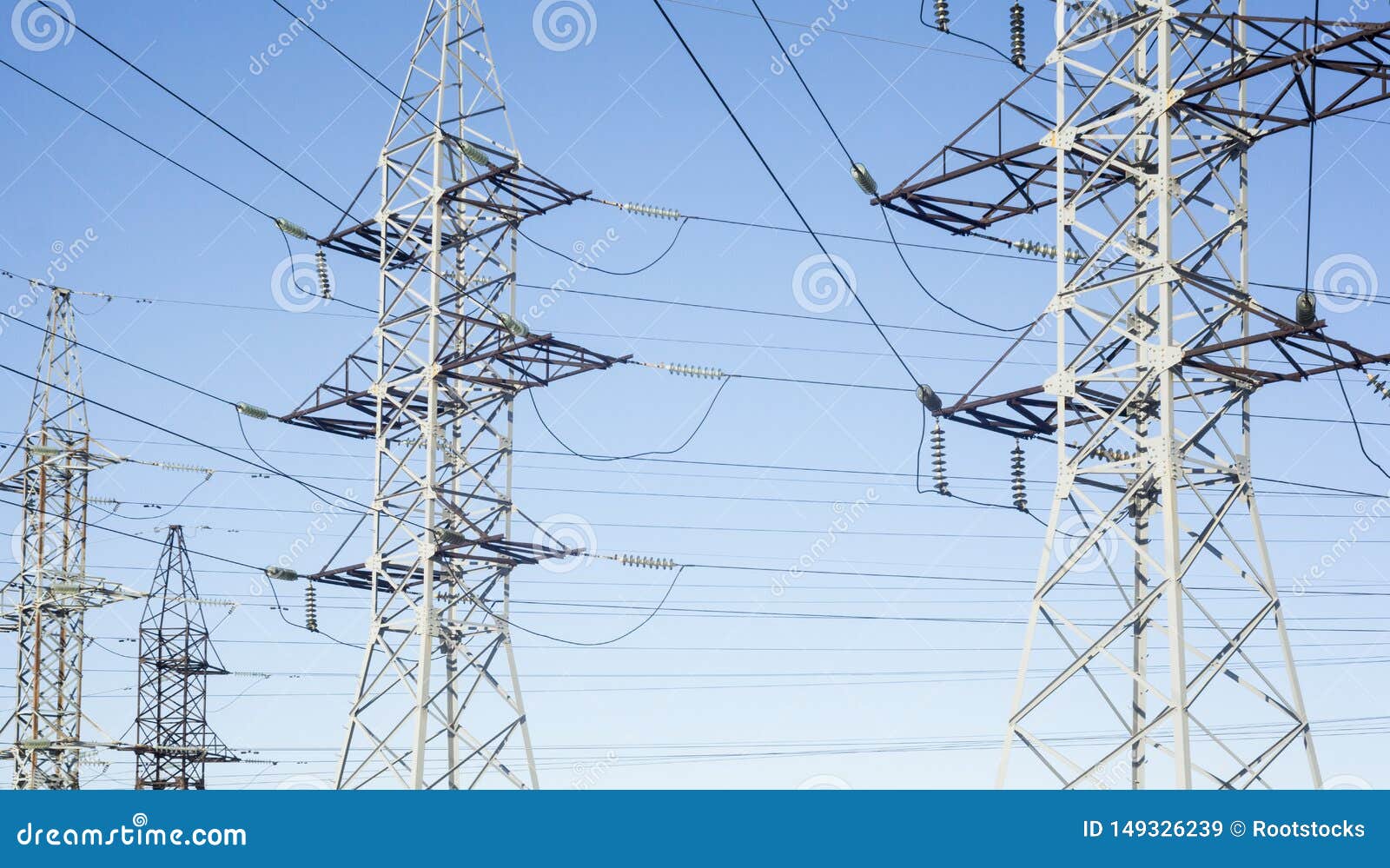 Electricity pylons stock image. Image of tall, mast - 149326239