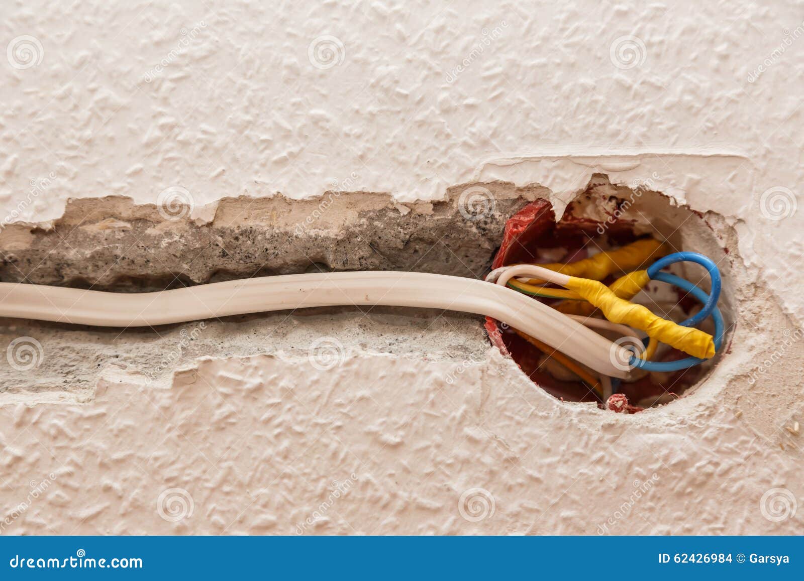 Socket Installation. A Master Electrician Installs An Electrical ...