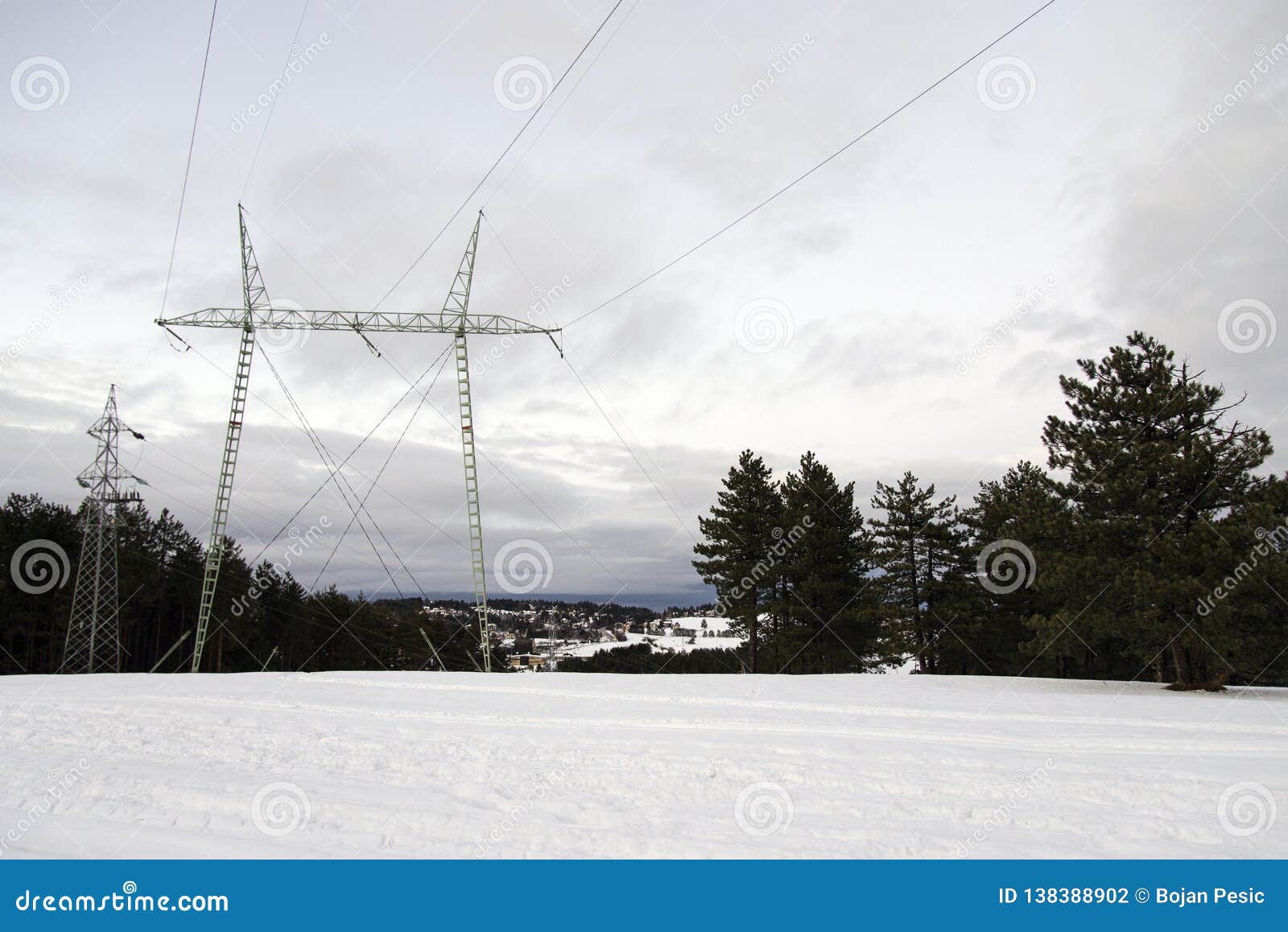 Electricity Tower in the Snow Stock Photo - Image of mountain, forest ...