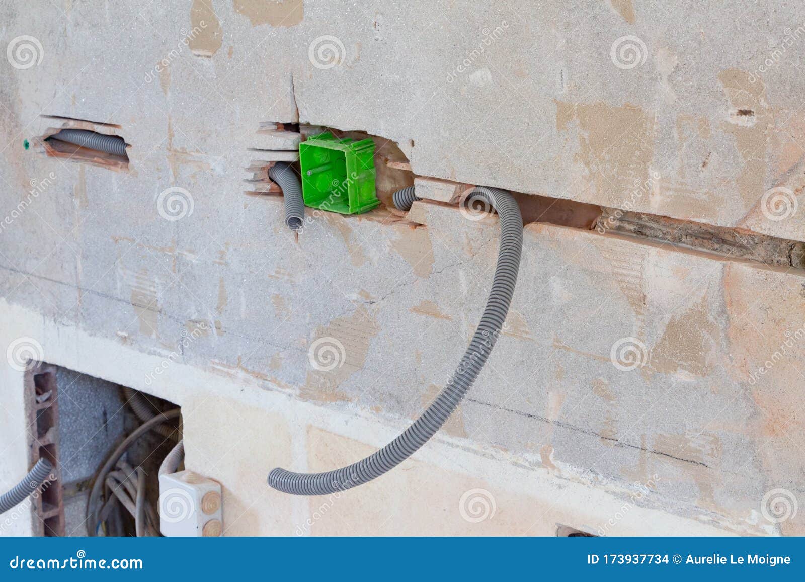 Electricity work in a wall stock photo. Image of electrical - 173937734