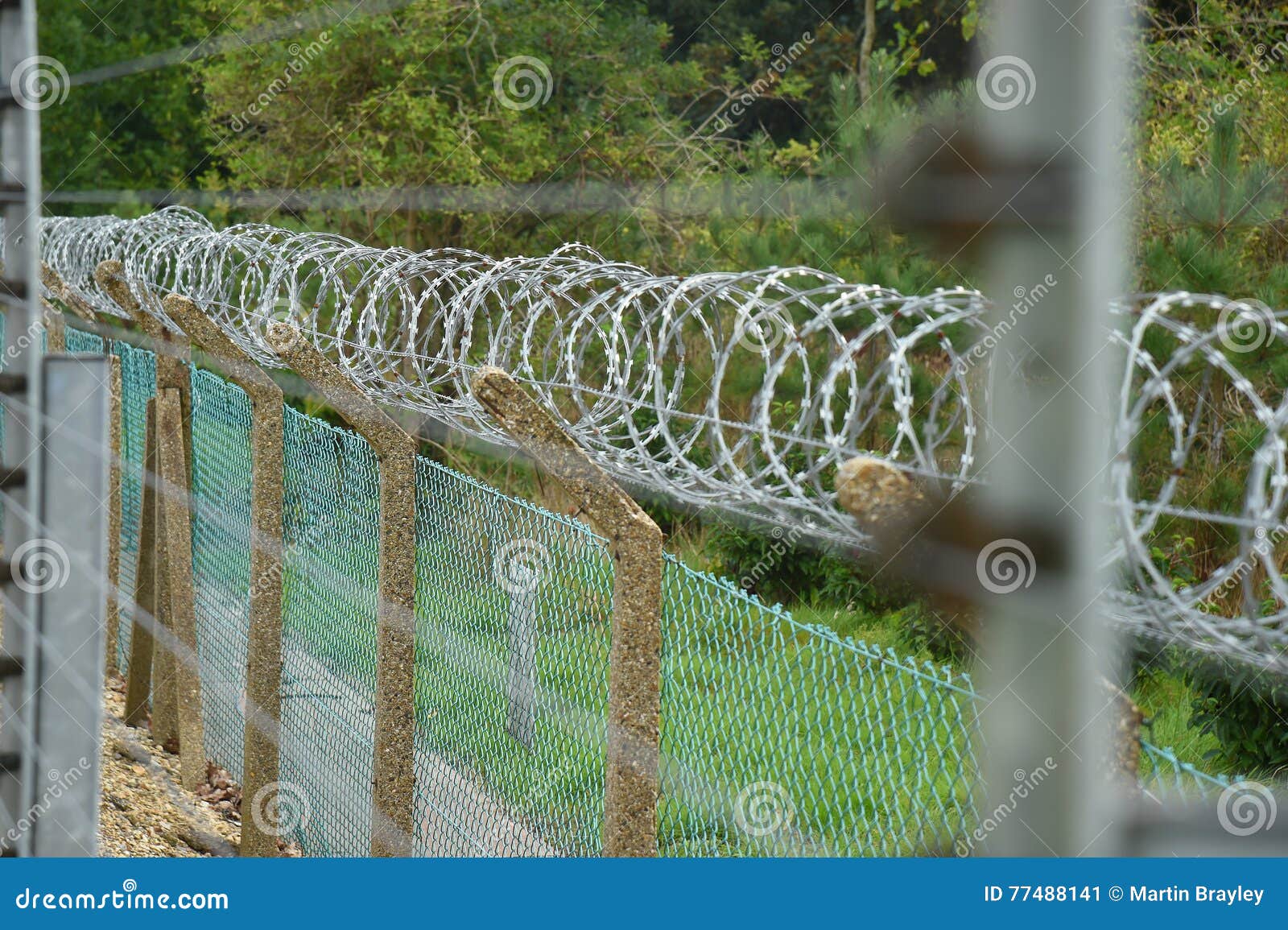 Electrified Security Fence and Razor Wire. Stock Image - Image of hope ...
