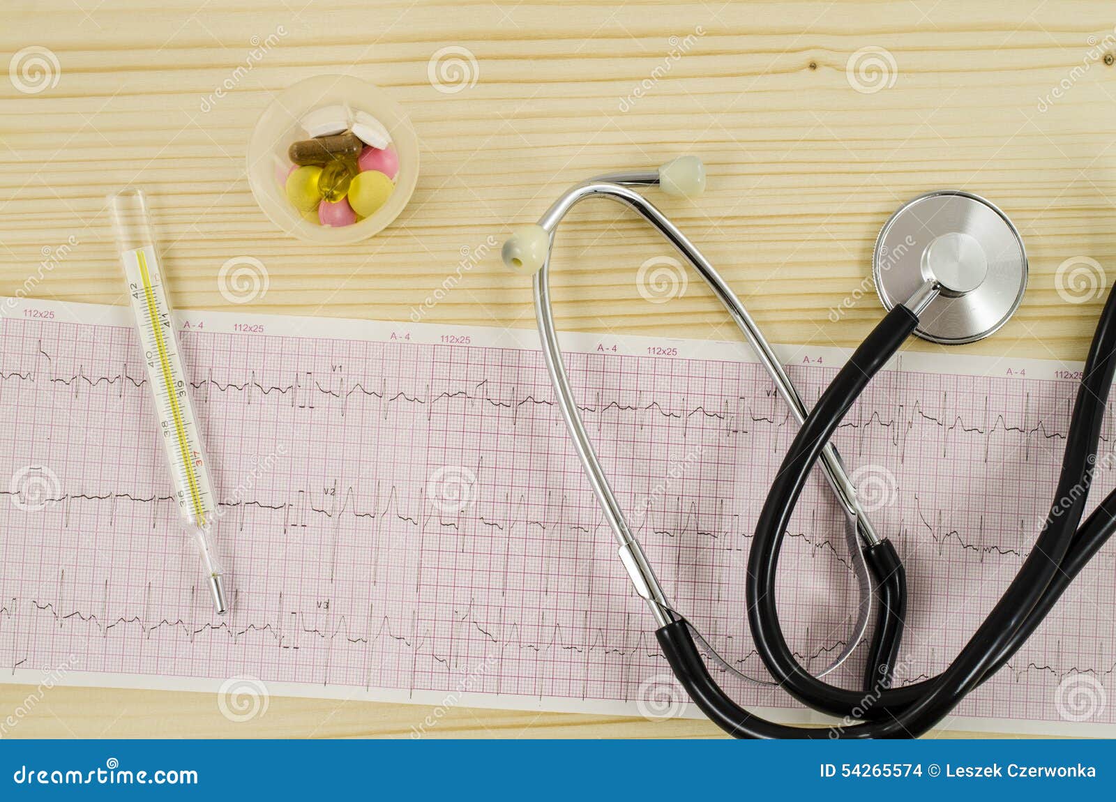 Electrocardiogram with Stethoscope on Wooden Table Stock Photo - Image ...