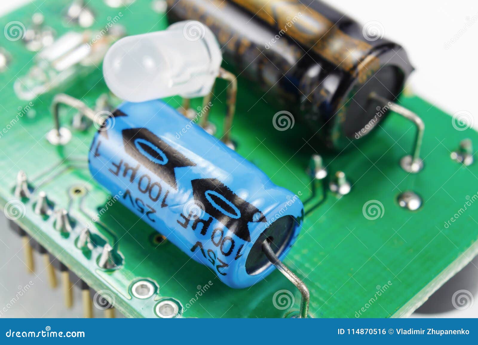 Electrolytic Capacitors and LED Diode on a Printed Circuit Board Stock ...
