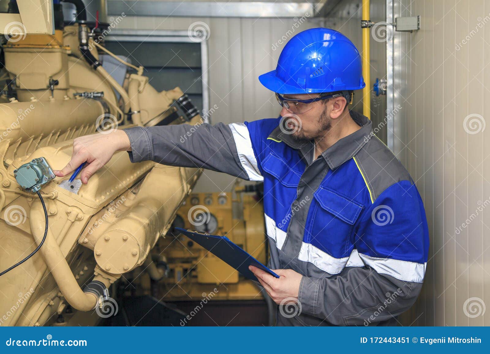 Electromechanic Performs Repair Work on a Diesel Generator Stock Image ...