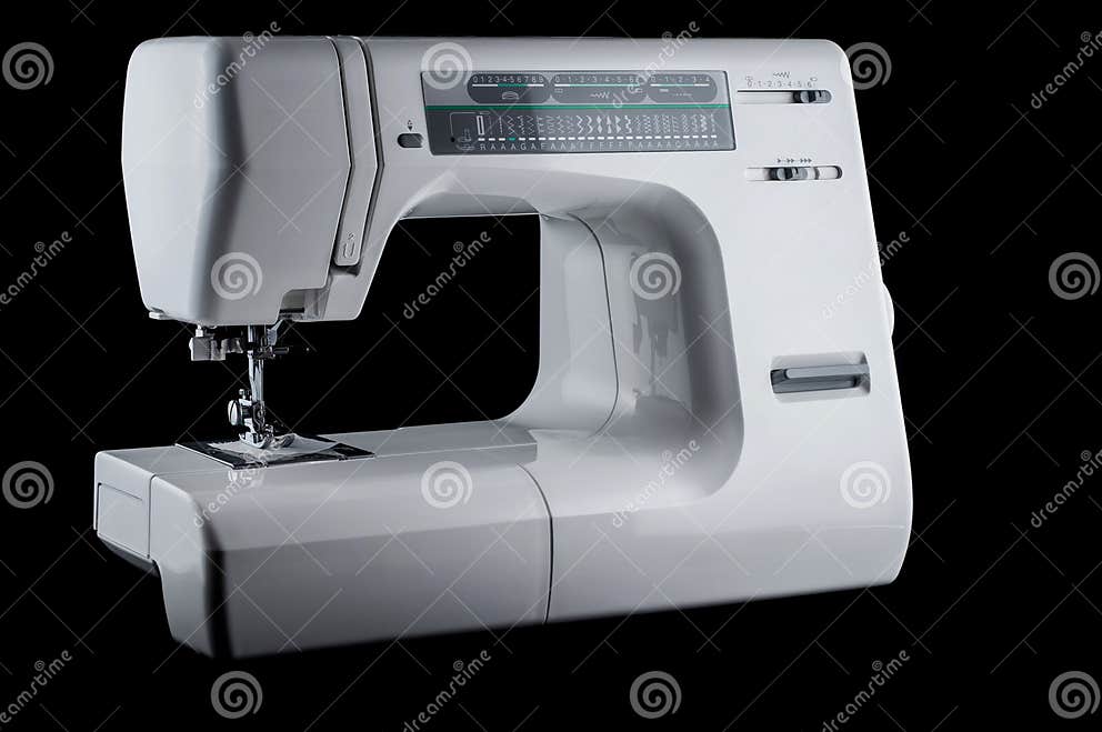 Electromechanical Modern White Plastic Sewing Machine on a Black ...