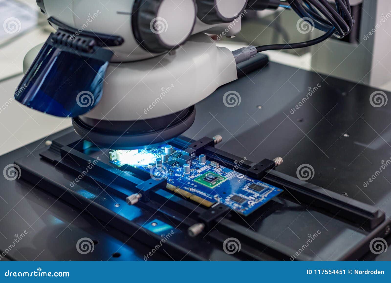 The Electronic Board is Checked Using an Electron Microscope. Stock ...
