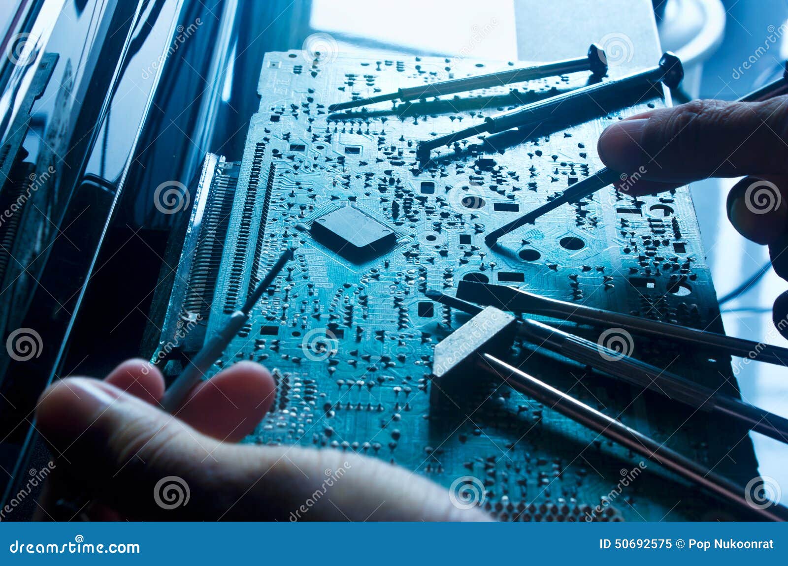 Electronic Board and Tools Repairs, Toned Blue Concept Stock Image ...