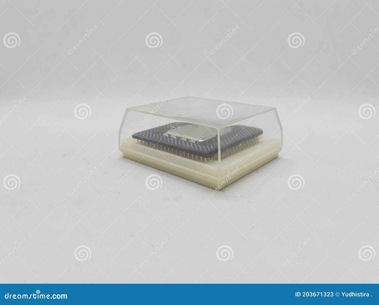 An Electronic Chip and it`s Container in White Isolation Background ...