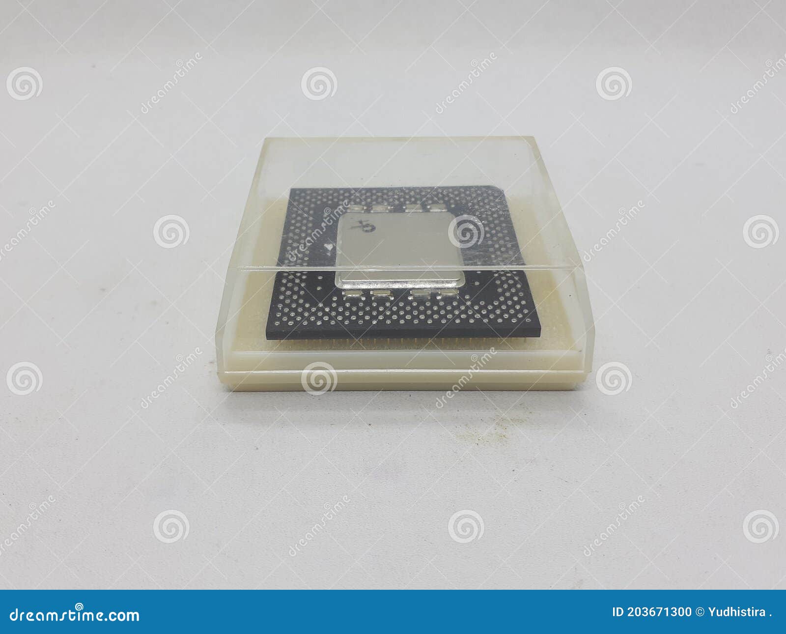 An Electronic Chip and it`s Container in White Isolation Background ...
