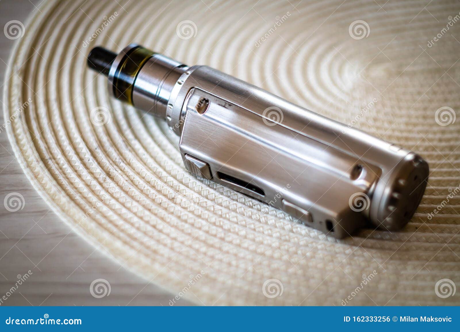Electronic Cigarette on White Wooden Table Stock Photo - Image of coil ...