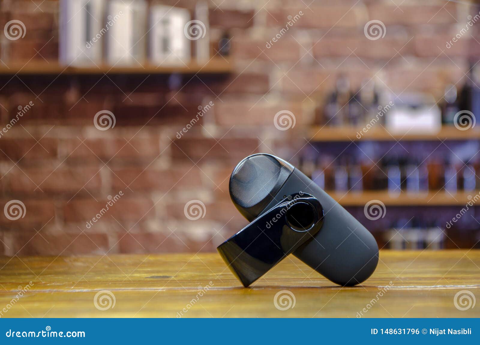 Electronic Cigarette on a Background of Vape Shop. Stock Photo - Image ...