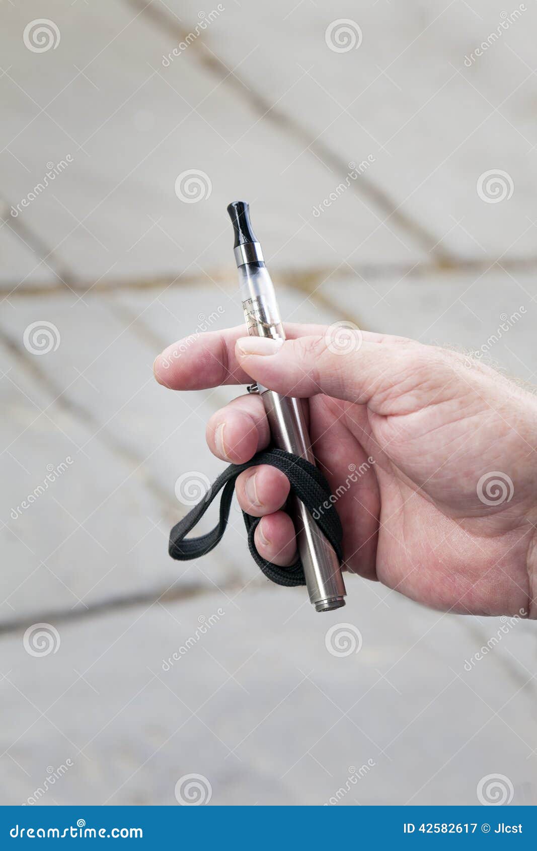 Cigarette In A Hand With Handcuffs Royalty-Free Stock Photo ...