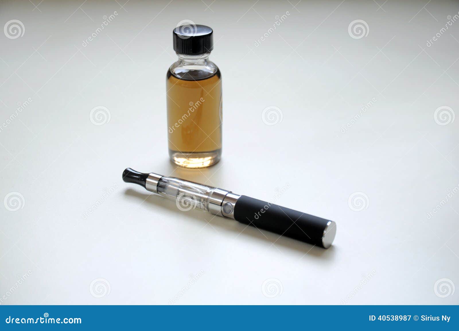 Electronic Cigarette and Liquid Stock Image - Image of vape, cessation ...