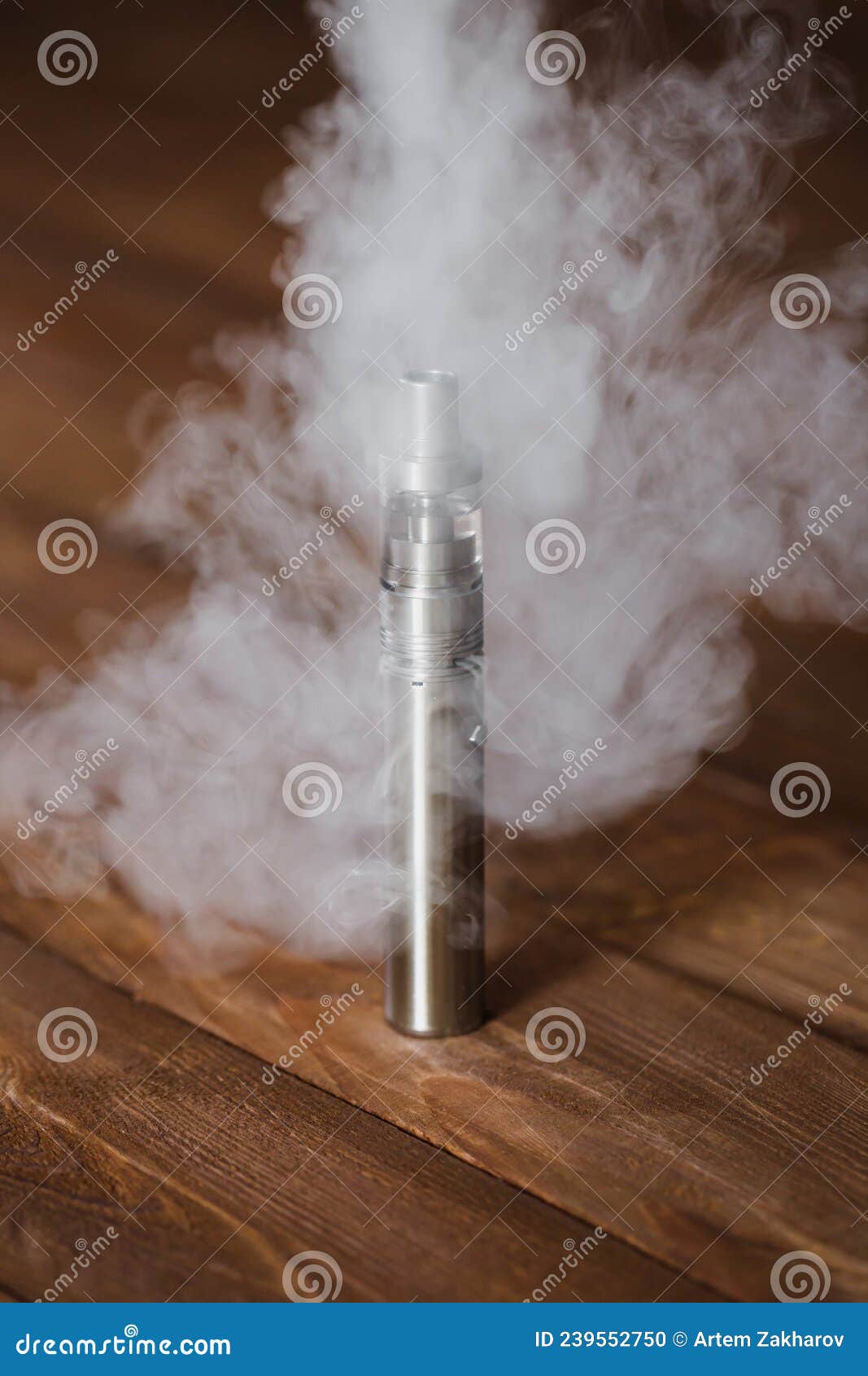 Electronic Cigarette on a Wooden Table. Smoke Stock Photo - Image of ...