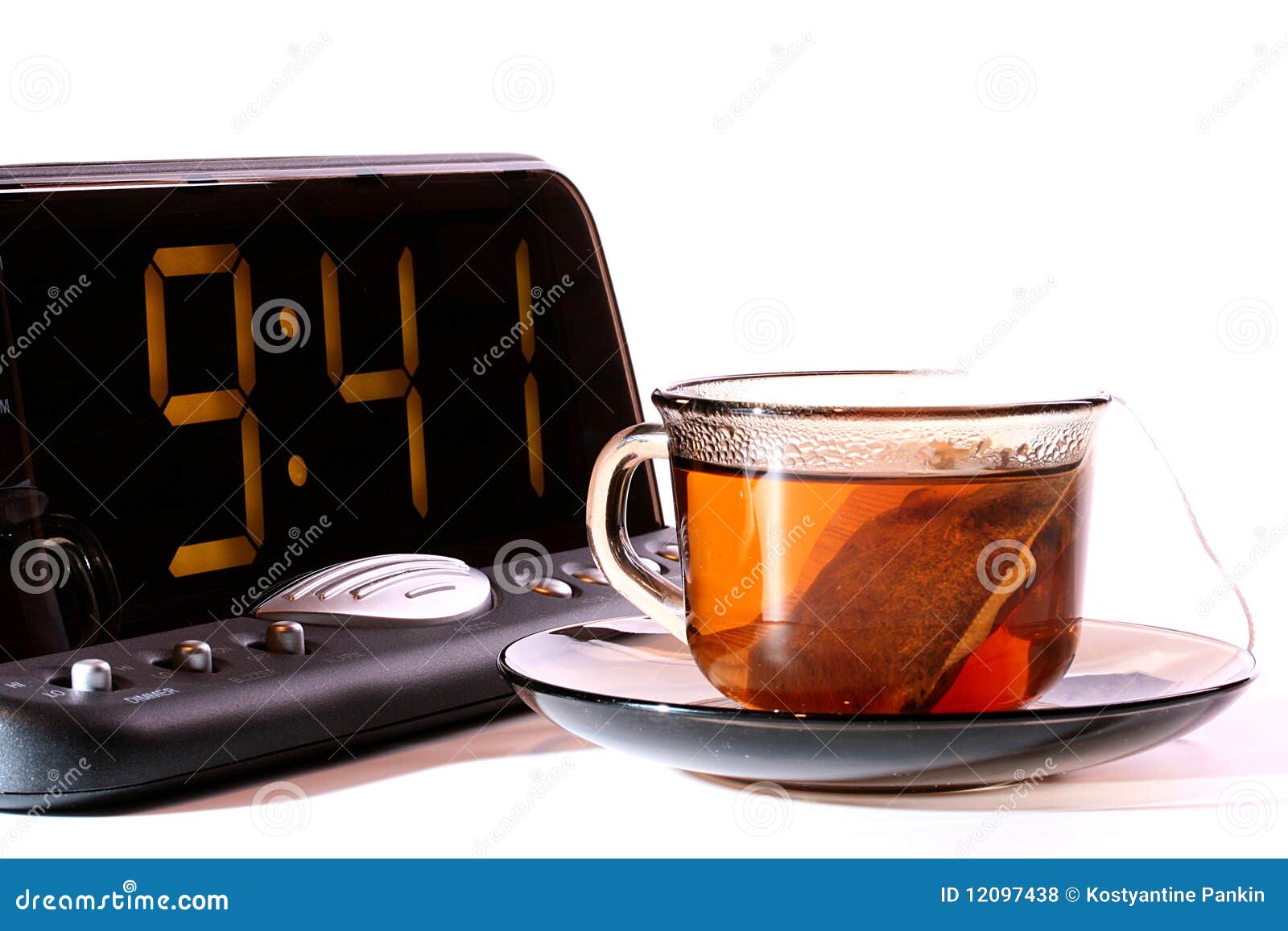 Electronic clock and tea stock photo. Image of contemporary - 12097438