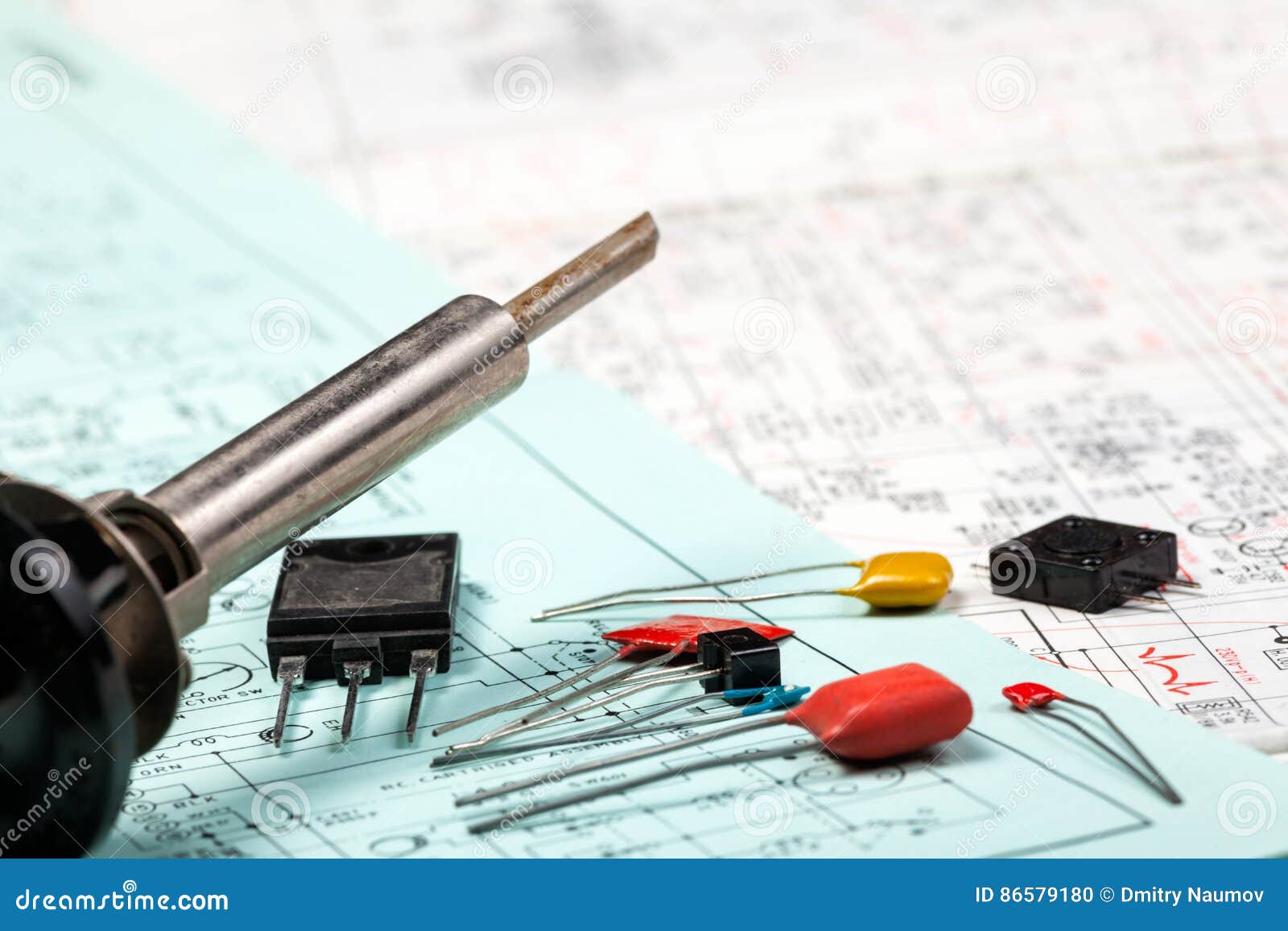 Electronic Components and Iron on Electric Schemes Stock Photo - Image ...