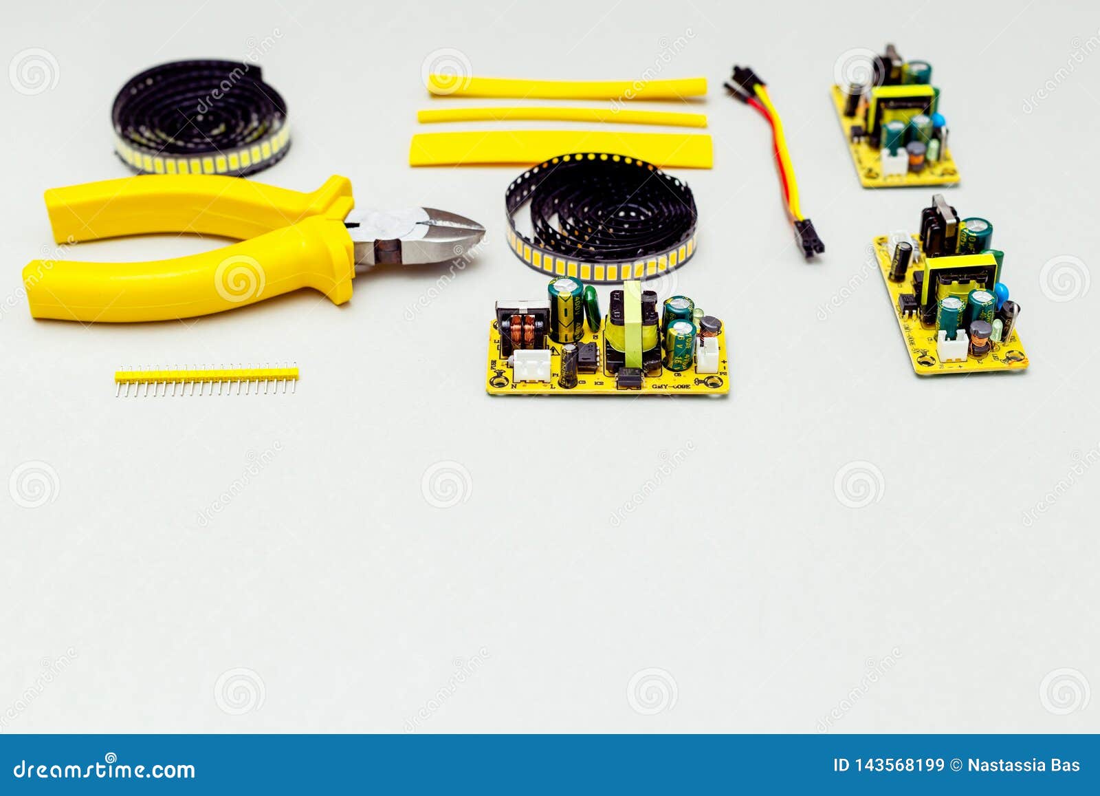 Electronic Device and Work Tools Yellow Color on Gray Background Stock ...