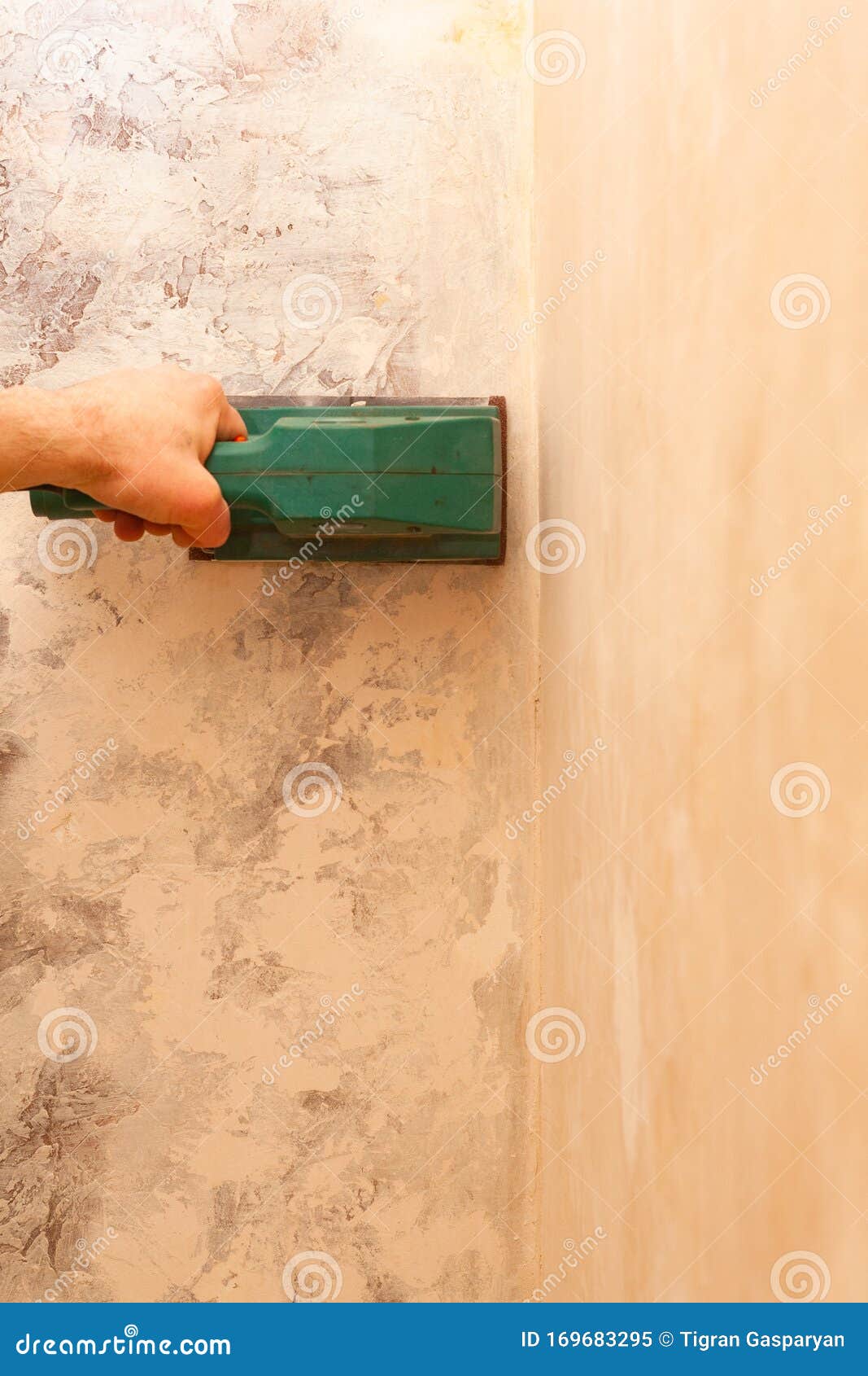 Electronic Grinder in a Hand. Grinding and Leveling the Surface of the ...