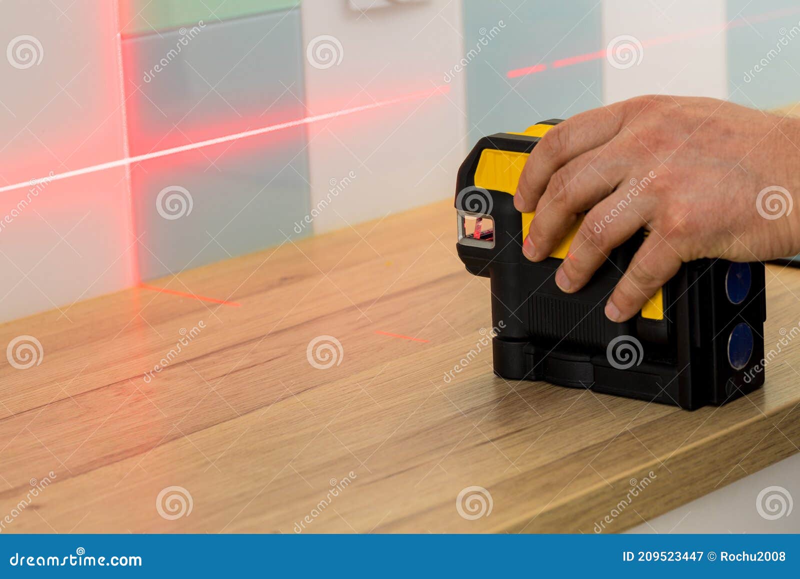 Electronic Laser Pointing Straight Lines. Checking Angles and Setting ...