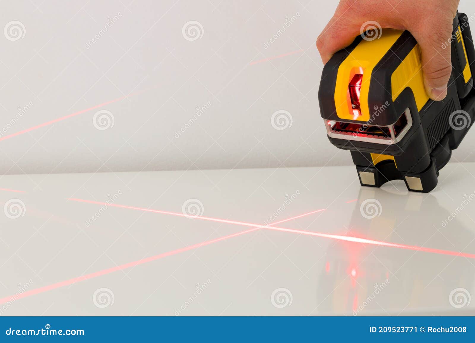 Electronic Laser Pointing Straight Lines. Checking Angles and Setting ...