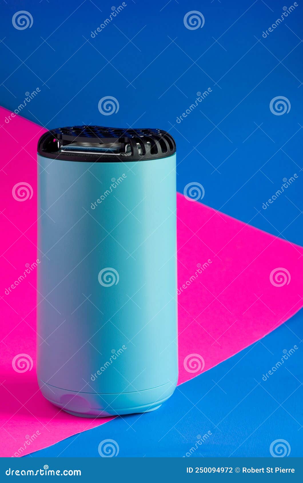Electronic Mosquito Repellent Machine on Pink and Blue Background Stock ...