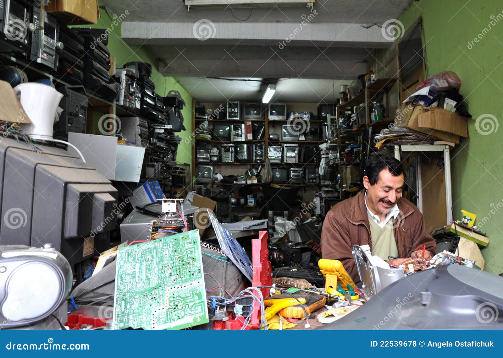 Electronic Repair Man editorial stock photo. Image of repairing - 22539678