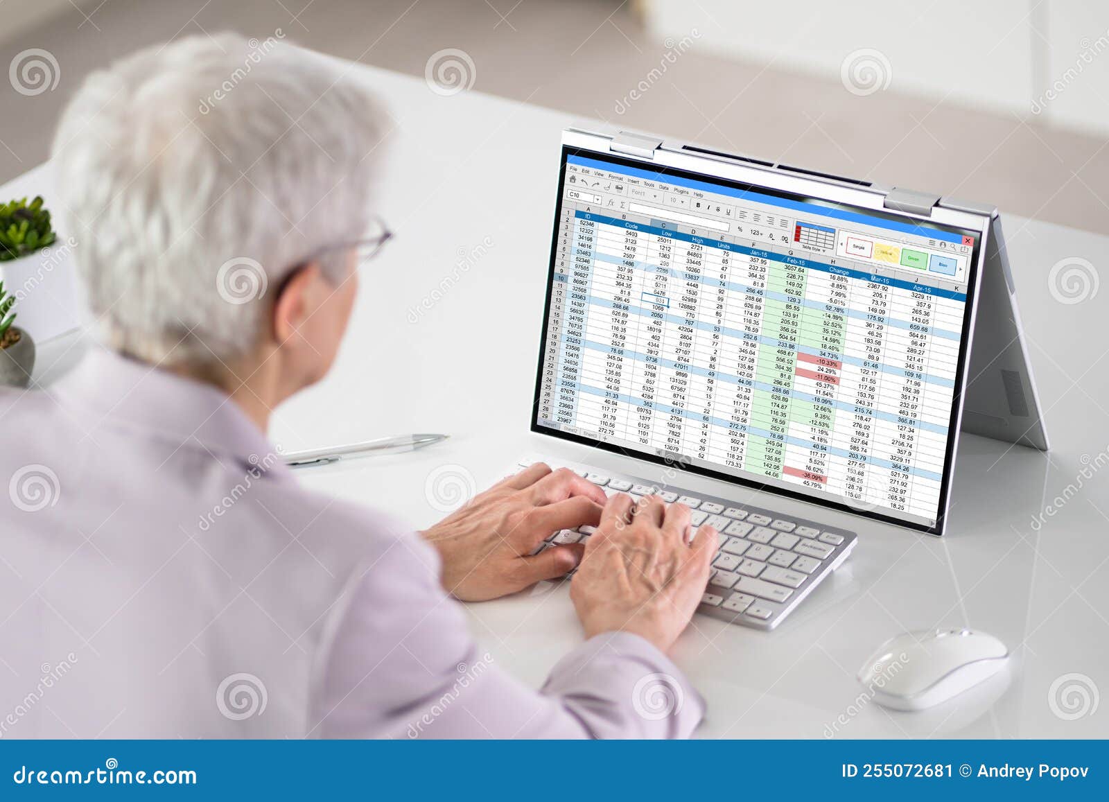 Electronic Spreadsheet Analyst or Auditor Using Software Stock Image ...