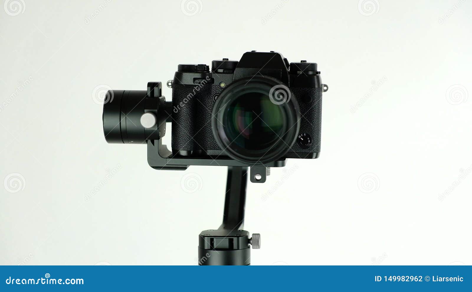 Electronic Stabilizer with Digital Camera Rotates on White Background ...